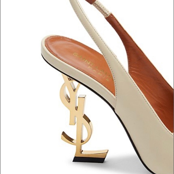 Yves Saint Laurent | Shoes | Ysl A Sculpted Logo Heel Anchors These ...